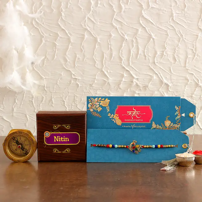 Peacock Rakhi and Personalised Compass Box Hamper germany | Gift ...