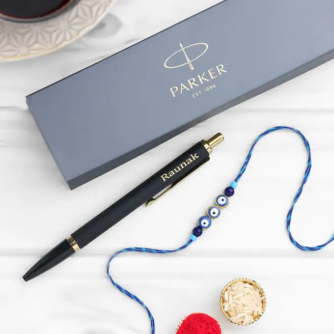 Minimalistic Evil Eye Rakhi & Parker Pen germany | Gift Minimalistic ...