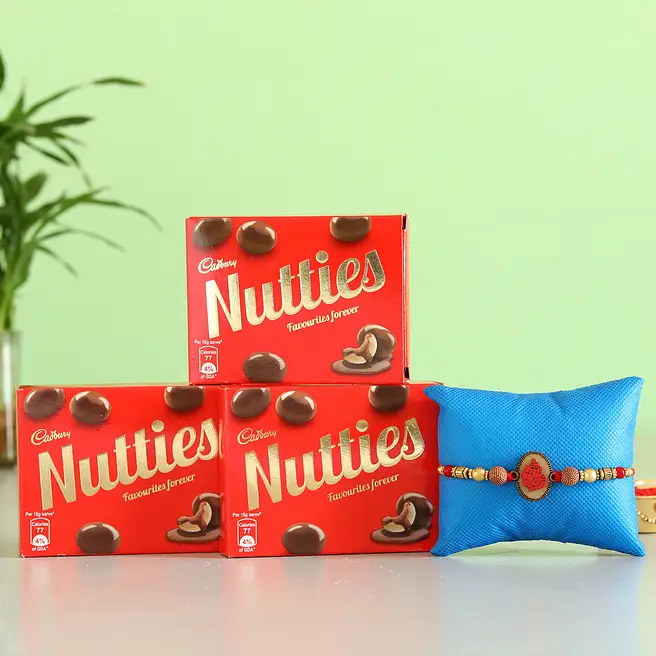 Buy/Send Ganesha Rakhi & Cadbury Nutties Online- FNP