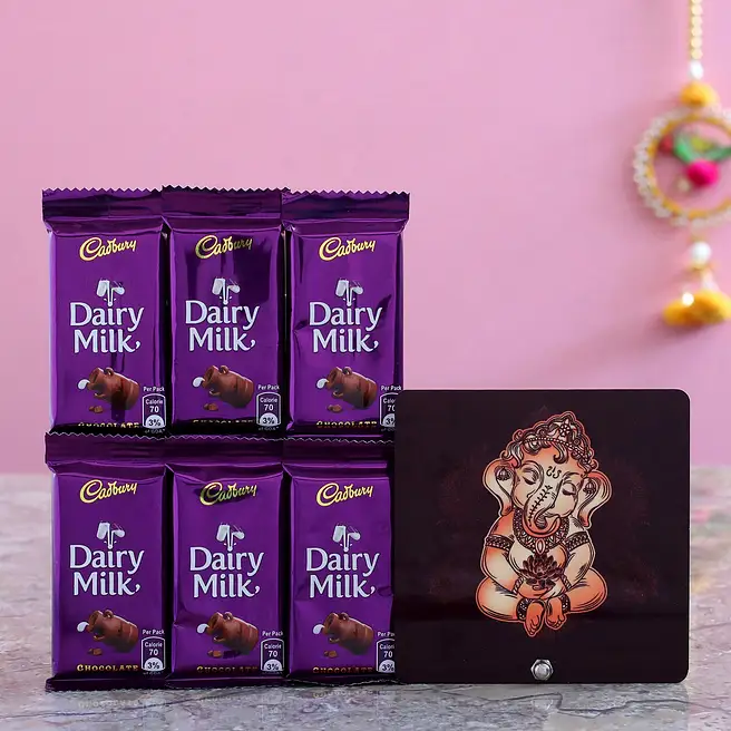 Buy/Send Bal Ganesha Table Top & 6 Dairy Milk Chocolates Combo Online- FNP
