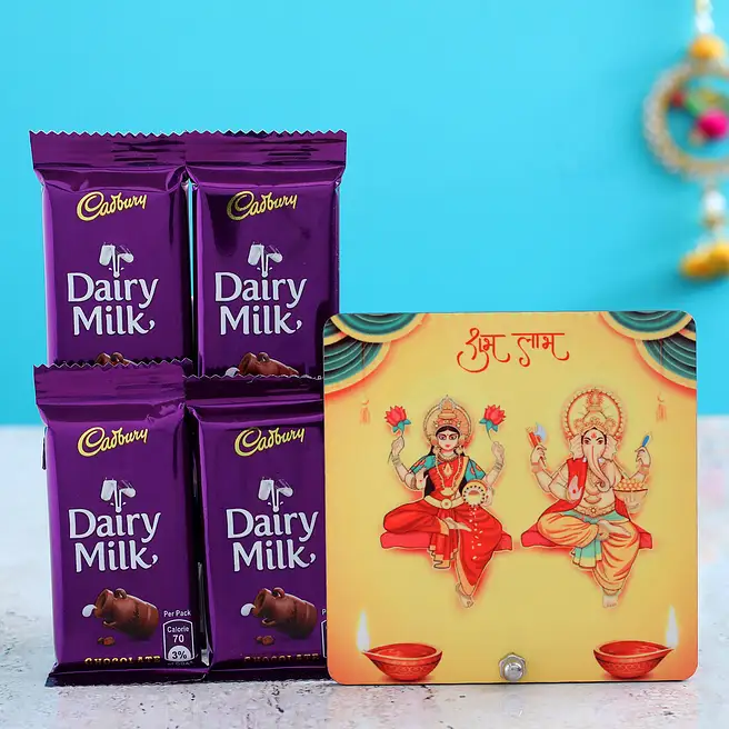 Buy/Send 4 Dairy Milk Chocolates & Lakshmi Ganesha Table Top Combo ...