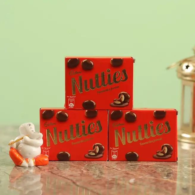 Buy/Send Cadbury Nutties & Festive Ganesha Idol Online- FNP