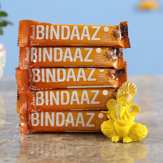 Buy/Send Bindaaz Wafer Chocos & Yellow Ganesha Idol Combo Online- FNP