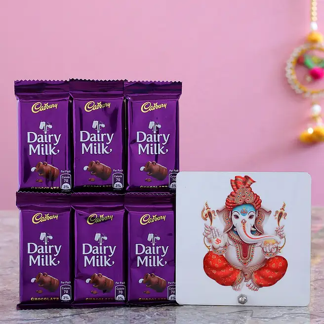 Buy/Send Ganesha Table Top & 6 Dairy Milk Chocolates Combo- C Online- FNP