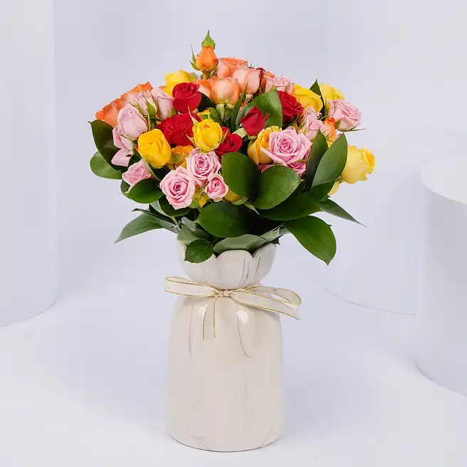Mixed Color Baby Roses Vase Arrangement qatar | Gift Mixed Color Baby ...