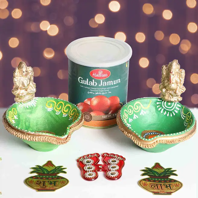 Designer Diya With Divine Stickers And Sweets uae | Gift Designer Diya ...