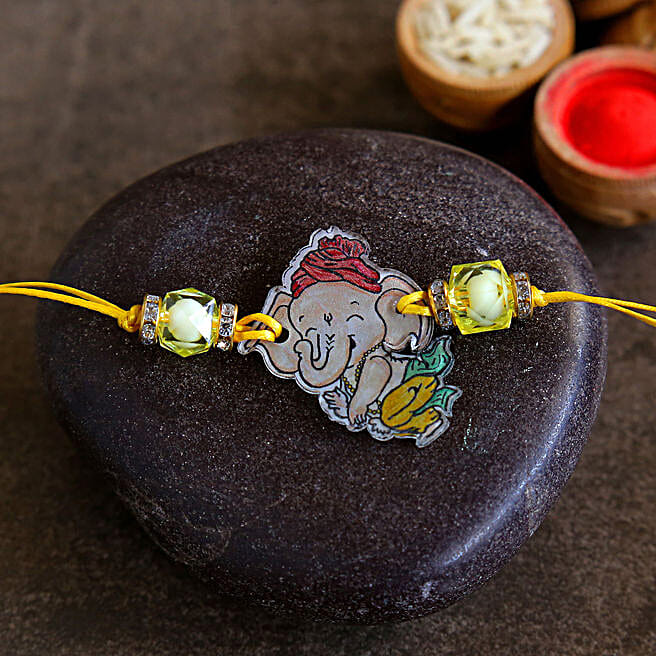 Divine Bal Ganesha Rakhi For Kids Exp uk | Gift Divine Bal Ganesha ...