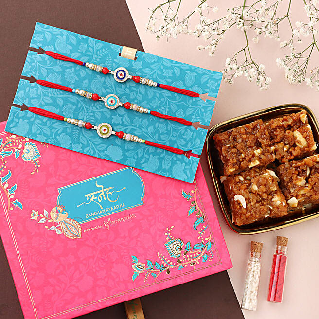 Sneh Spiritual Evil Eye Rakhi Set & Haldiram Dodha Barfi usa | Gift ...